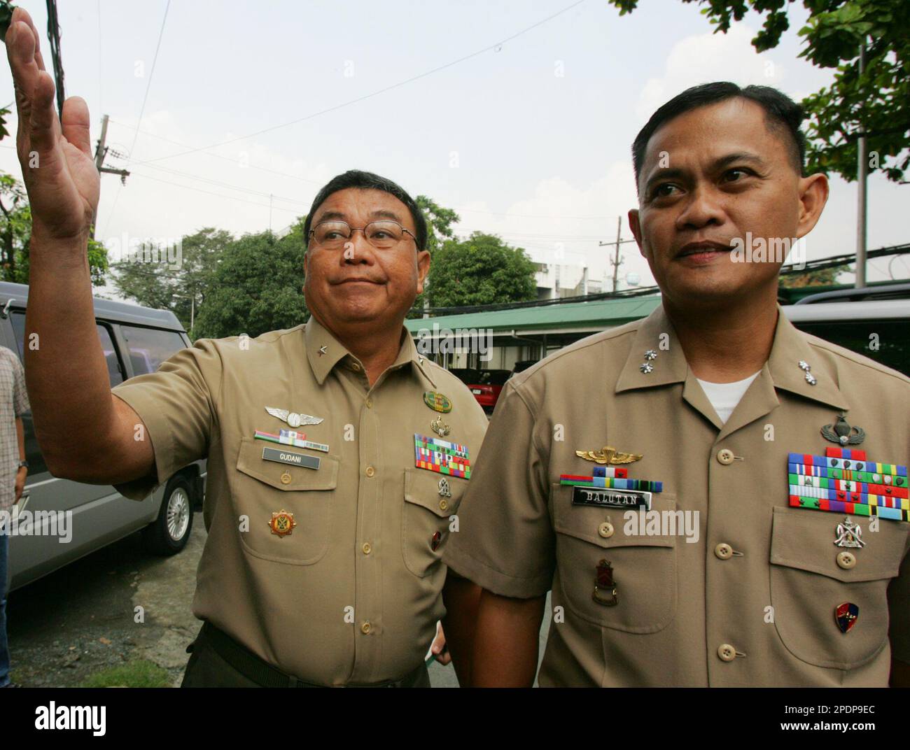 Philippine Marines Brigadier-General Francisco Gudani, left, gestures ...
