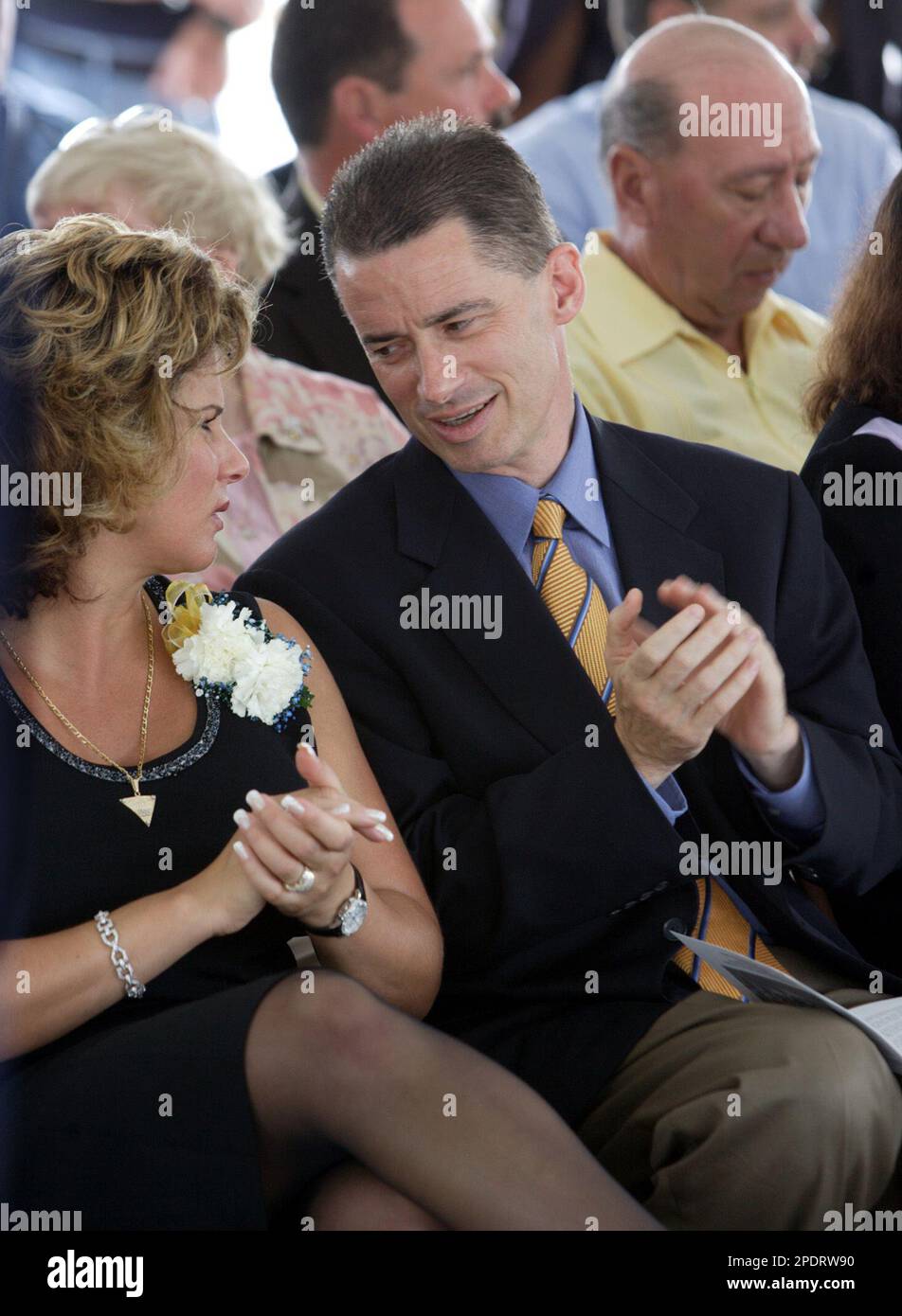 Former New Jersey Gov. James E. McGreevey talks with Lisa Scales, widow ...