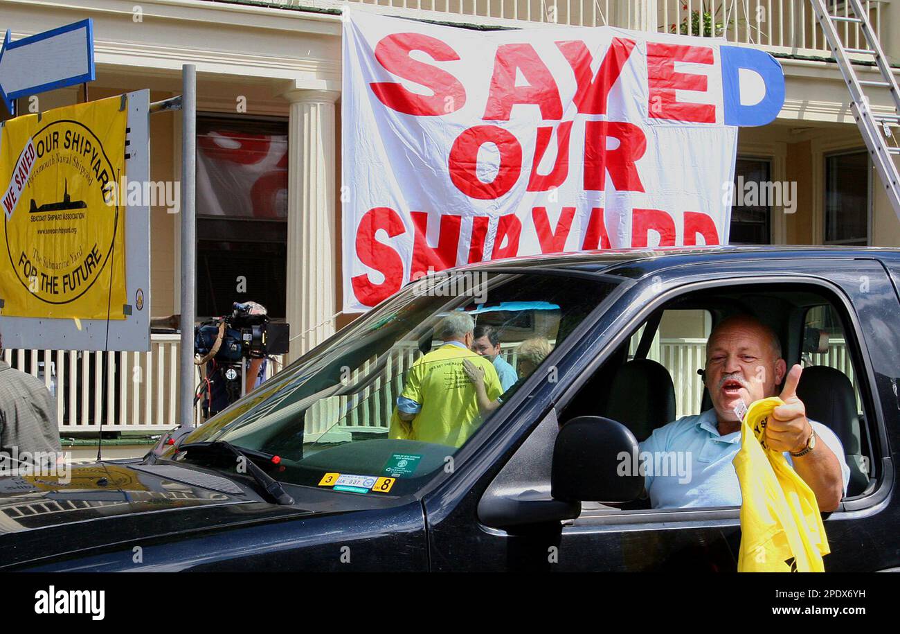 Rick Bean of Dover, N.H. cheers as he leaves for lunch after learning ...