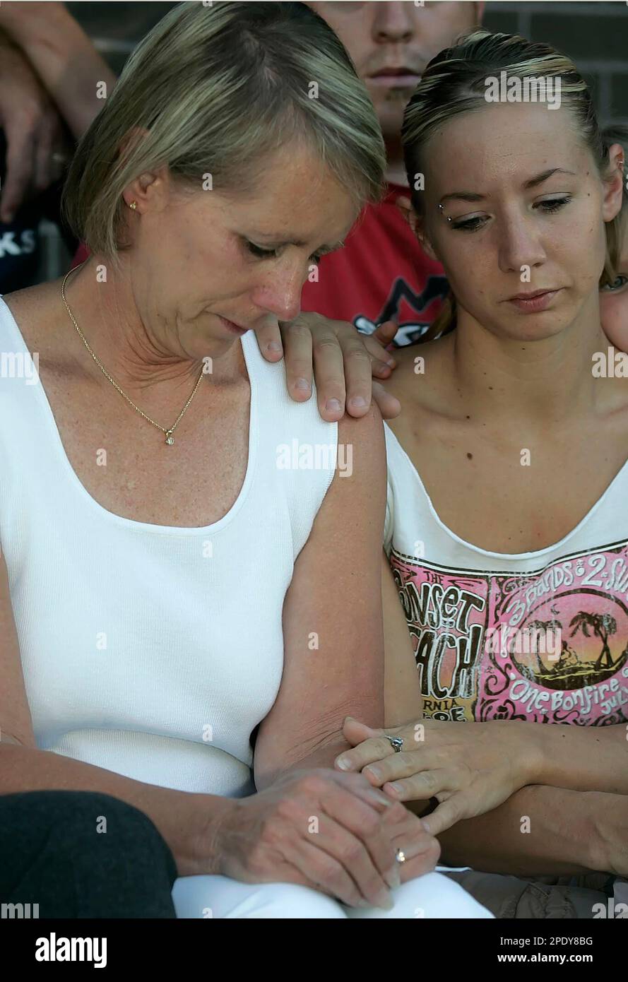 Sally Lambson, left, mother of Jennifer Forsyth Hyatte holds back tears ...