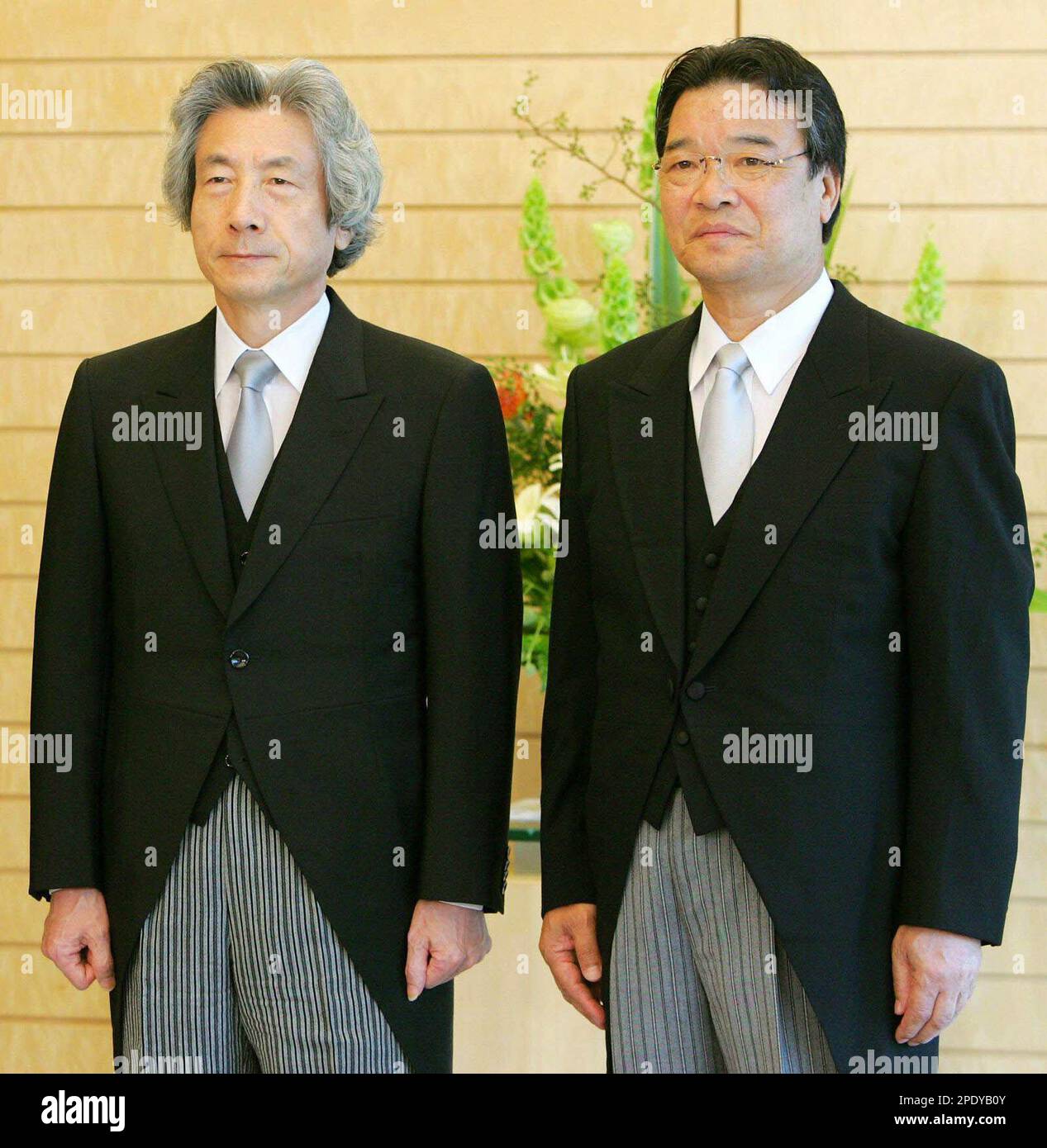 Japan's Prime Minister Junichiro Koizumi, left, and Mineichi Iwanaga ...