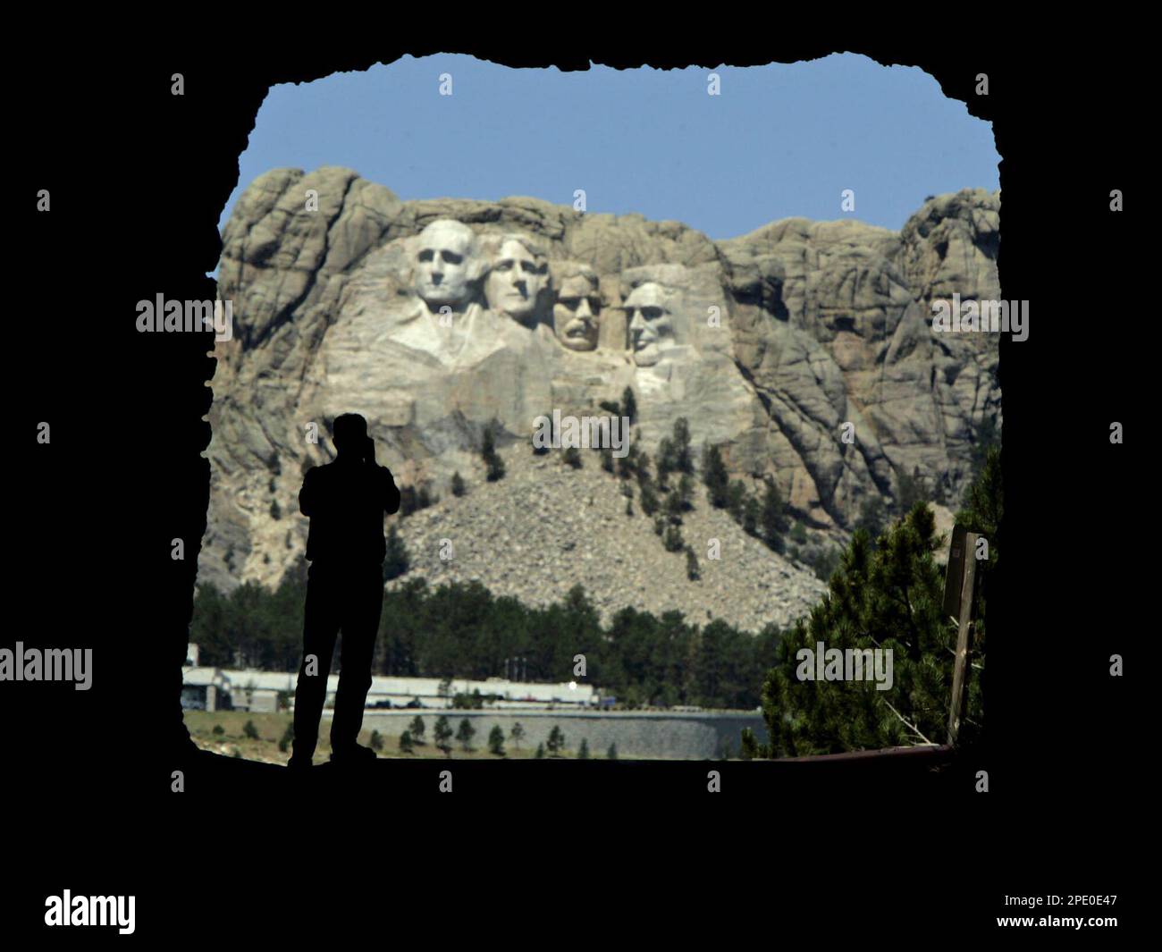 Gary Randol, from St. Peters, Mo., watches from a highway tunnel as ...