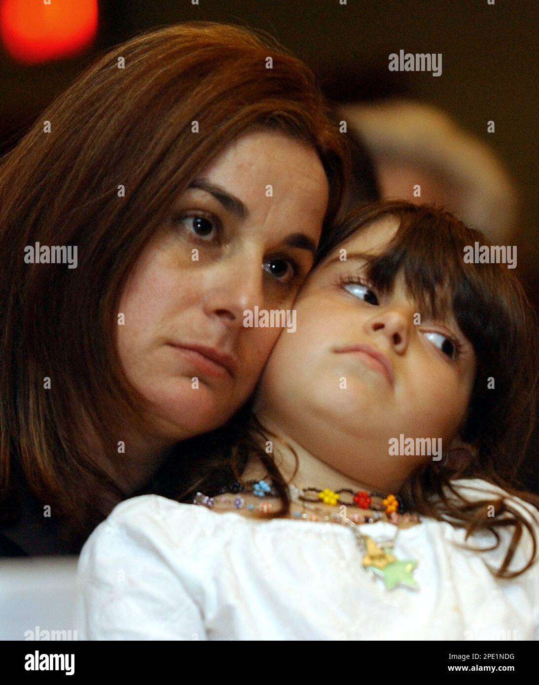 Rona Ramon, left, and her daughter Nora, 5, wife and daughter of Israel ...