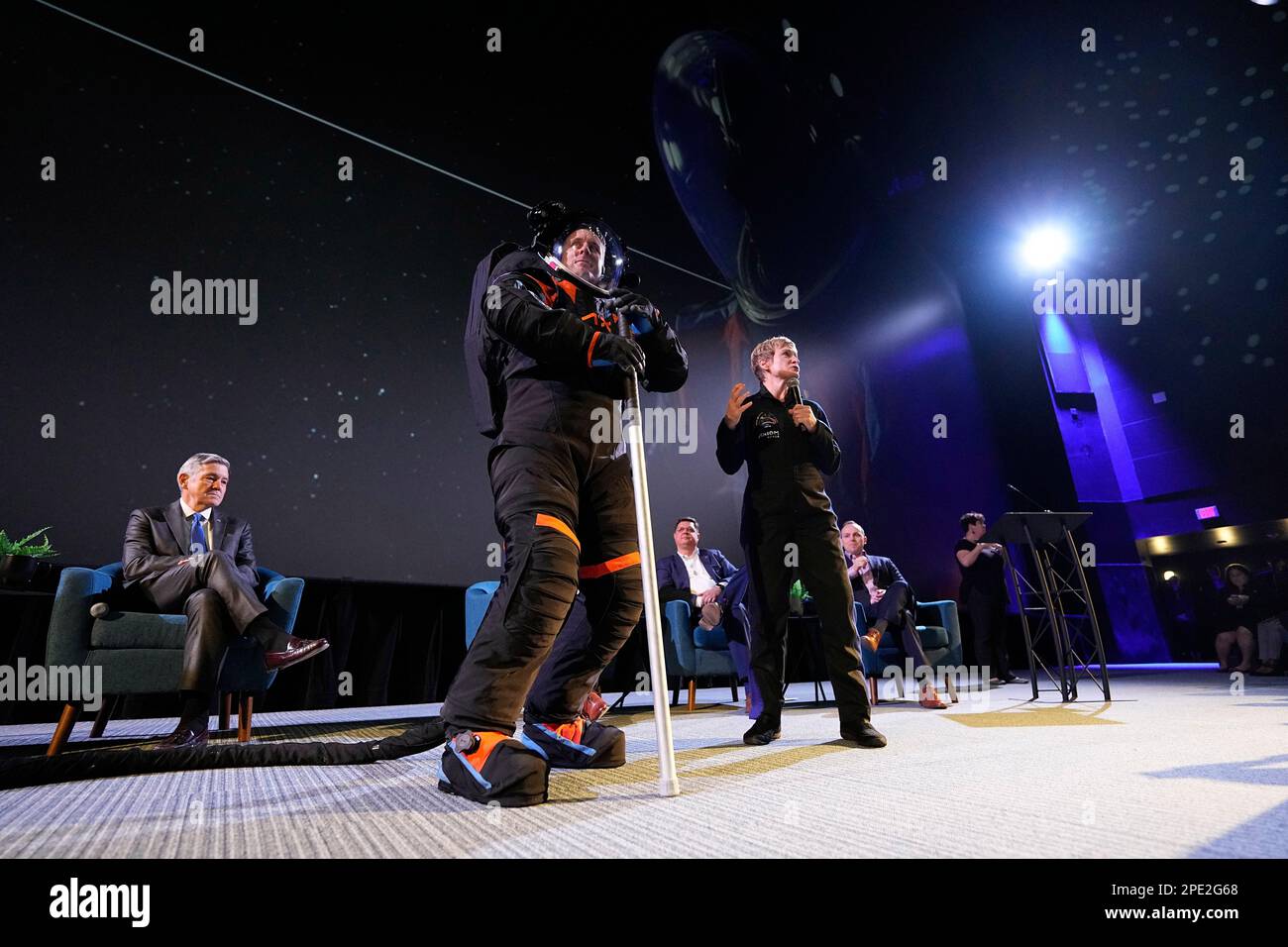 Axiom Space chief engineer Jim Stein, left, demonstrates a prototype ...