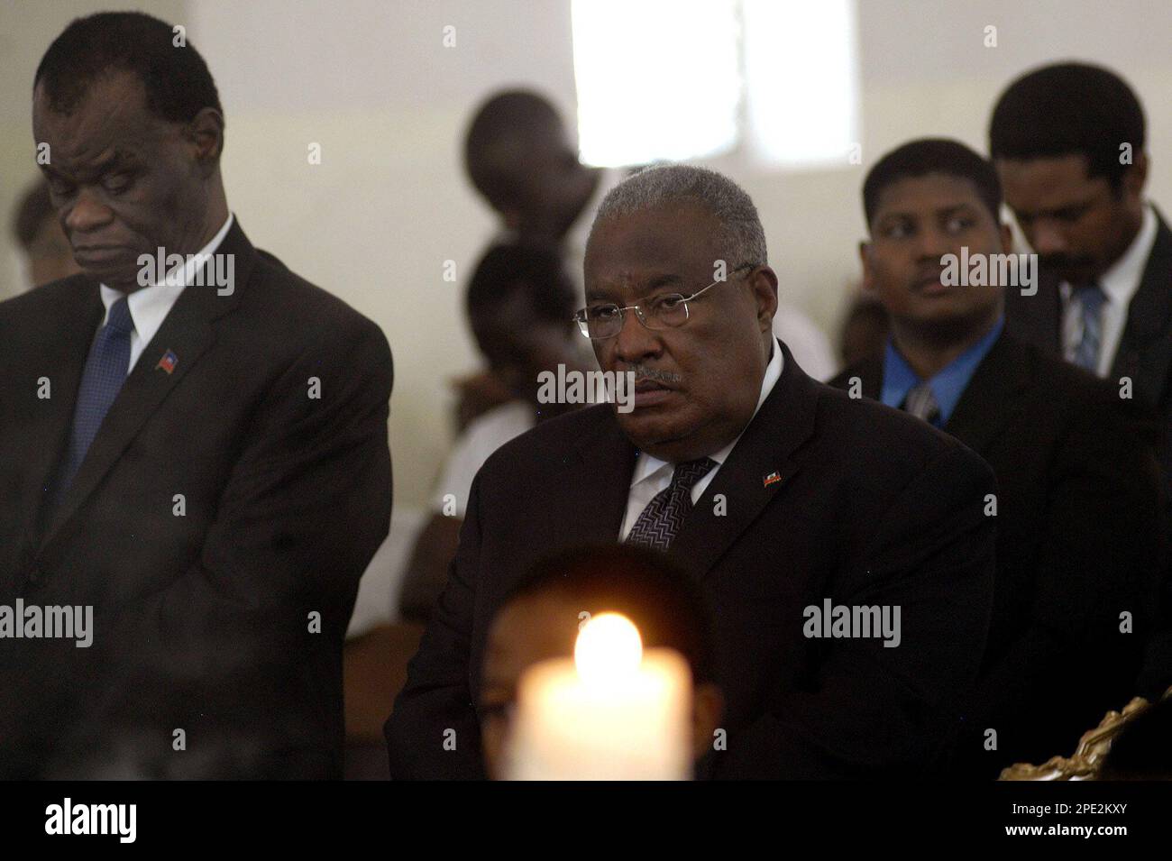 Haiti's interim Prime Minister Gerard Latortue, center, and interim ...