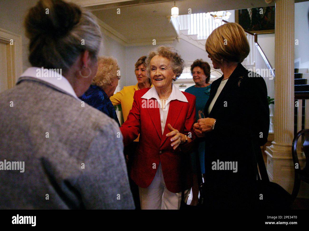 Alaska's first ladies greet each other upon arriving at the governor's ...