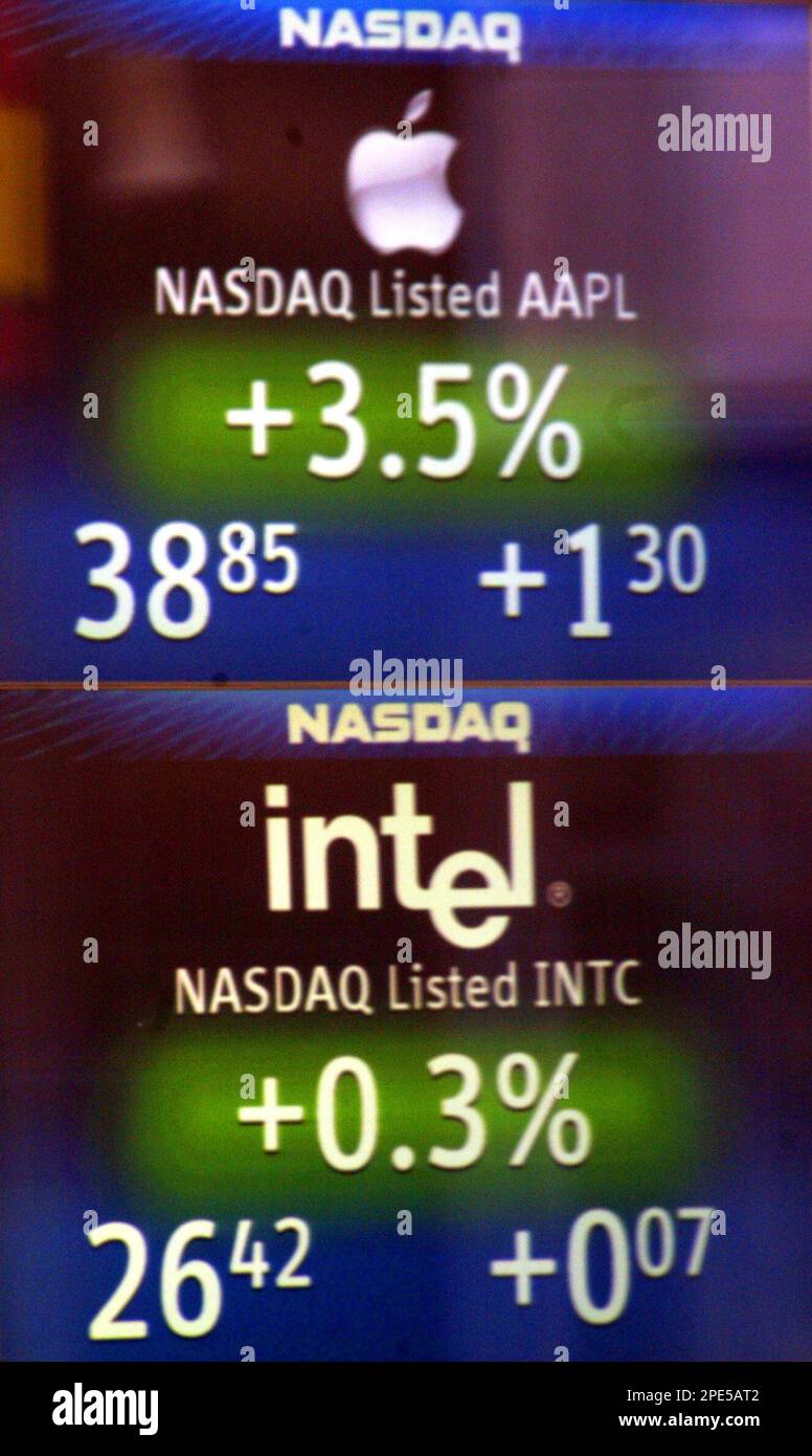 Early trading prices for Apple and Intel are on display on the ...