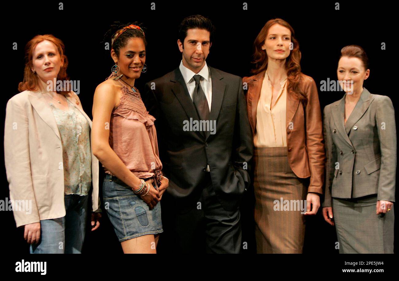 U.S. actor David Schwimmer, centre, poses for photographs on stage with ...