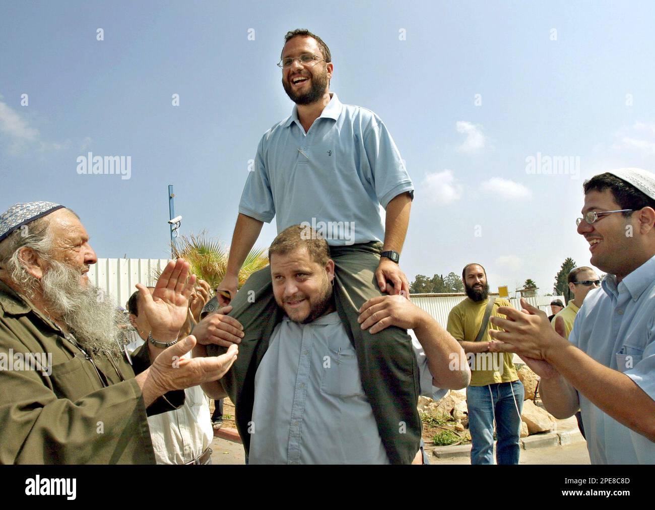 Noam Federman, an extremist Jewish settler in Hebron, is carried on an ...