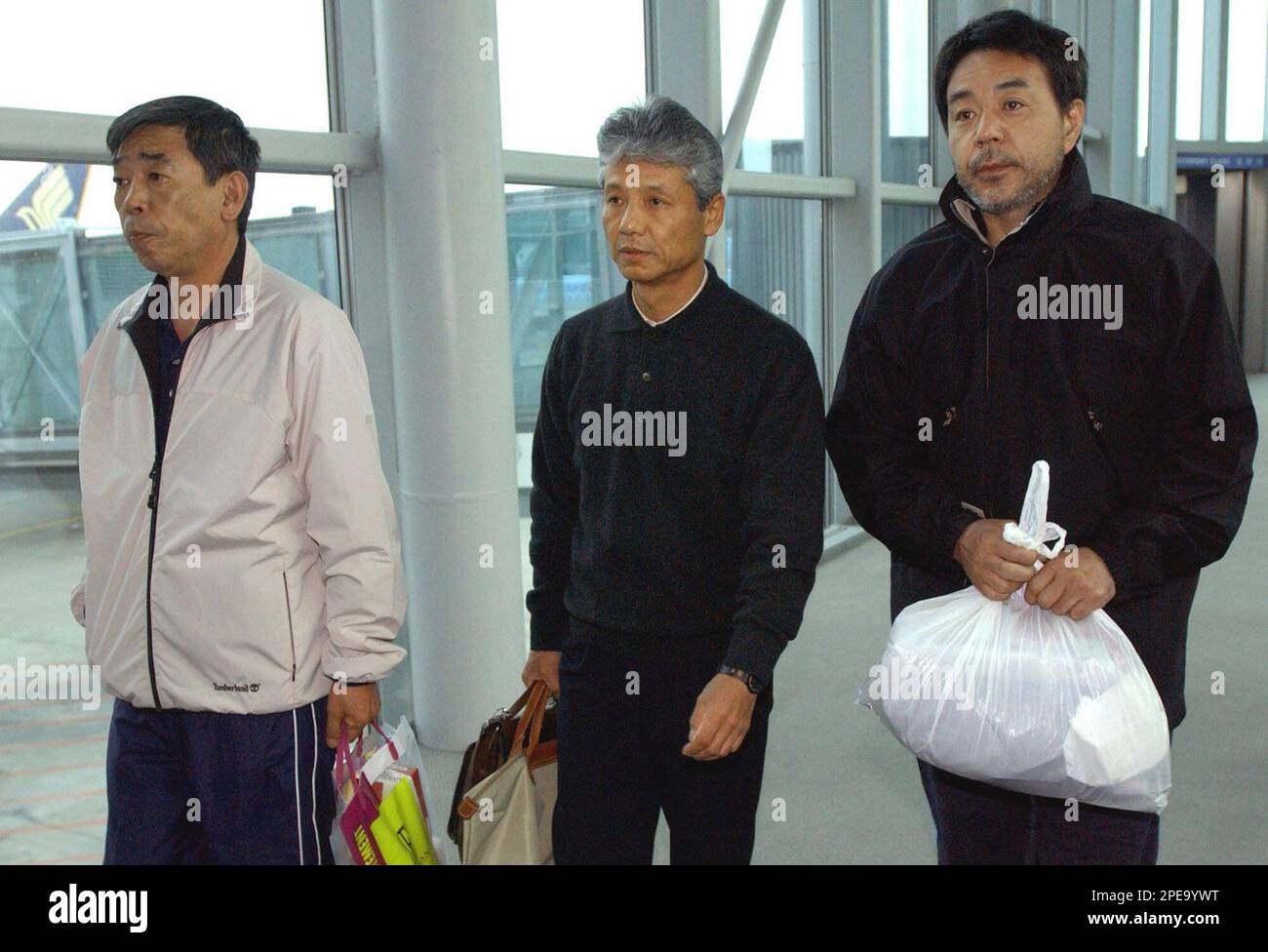Released two Japanese seamen, 56-year-old captain Nobuo Inoue, left, and 50-year-old chief ...