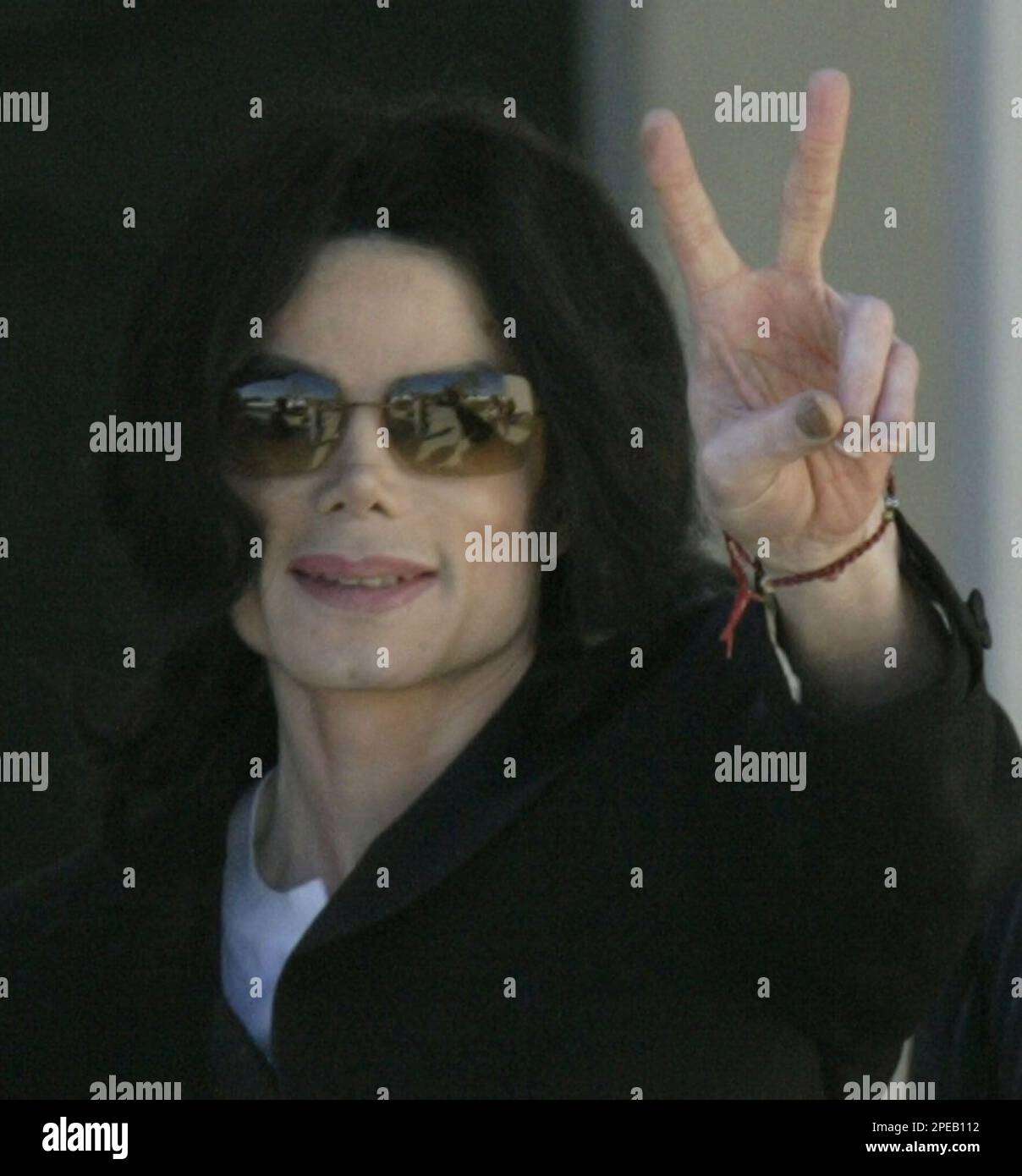 Michael Jackson leaves the Santa Barbara County Courthouse , Thursday ...