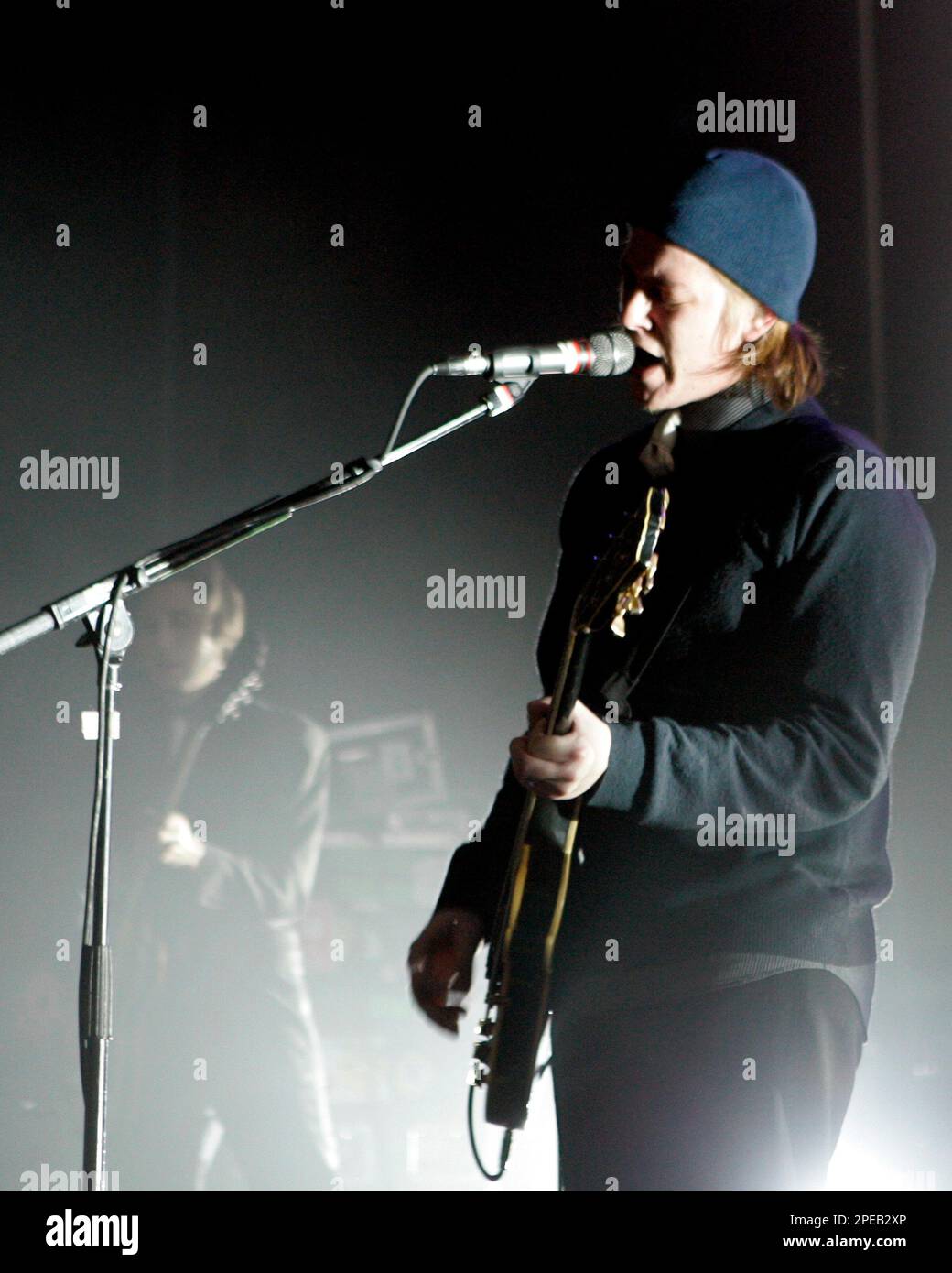 Daniel Kessler, guitarist, and lead vocalist and guitarist Paul Banks ...