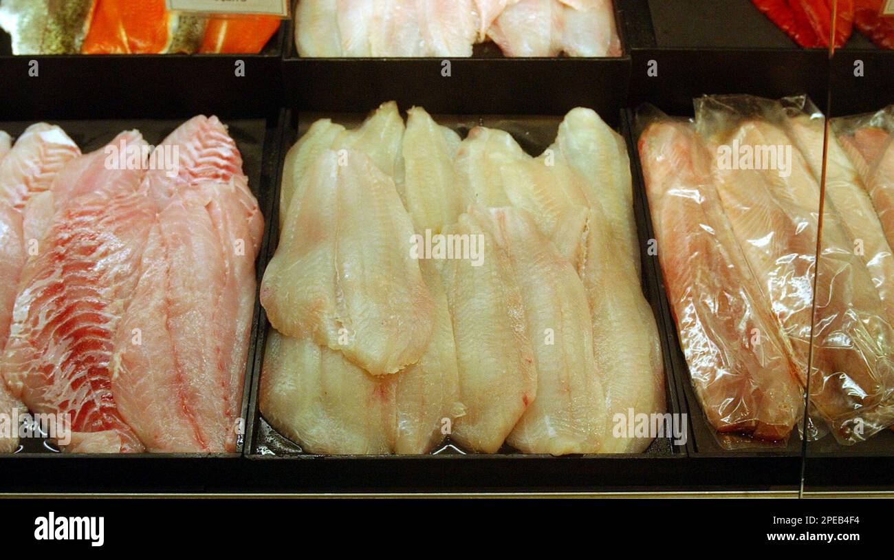 North American flounder, center, is shown Wednesday, March 9, 2005, in ...