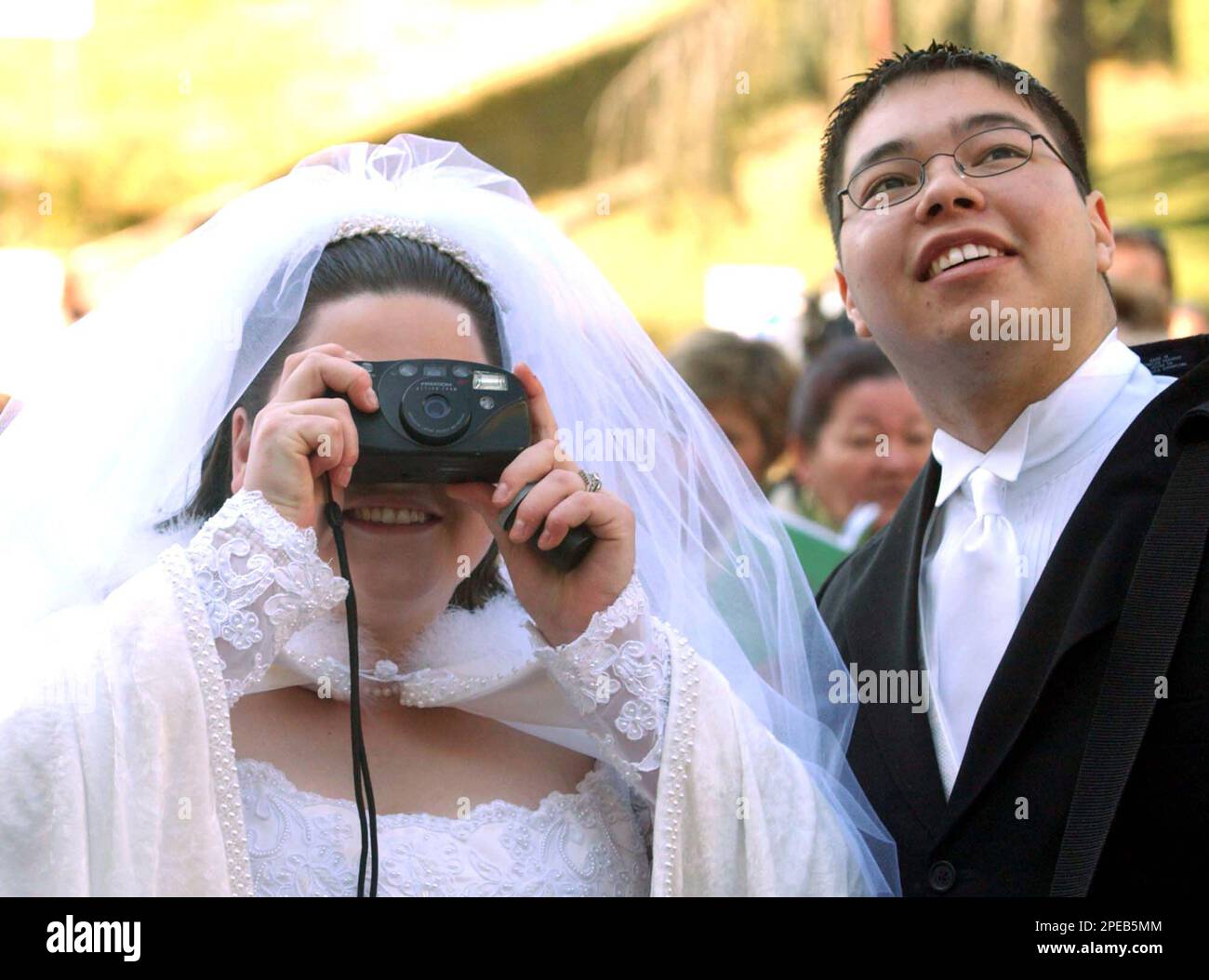 Newlyweds Darlene and Christopher Marquez of New Mexico, in their ...