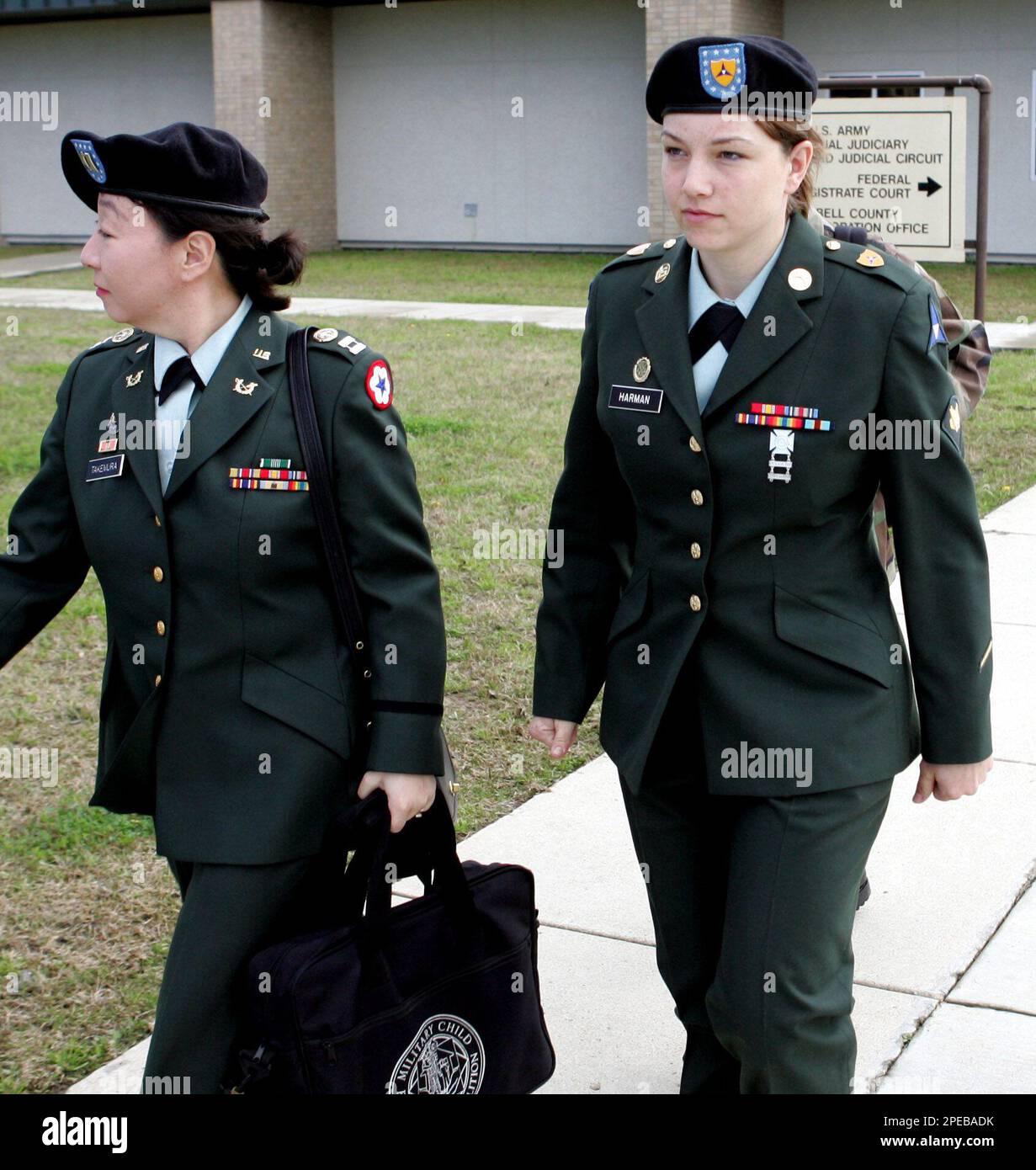 Spc. Sabrina D. Harman, right, and her attorney Capt. Patsy Takemura ...