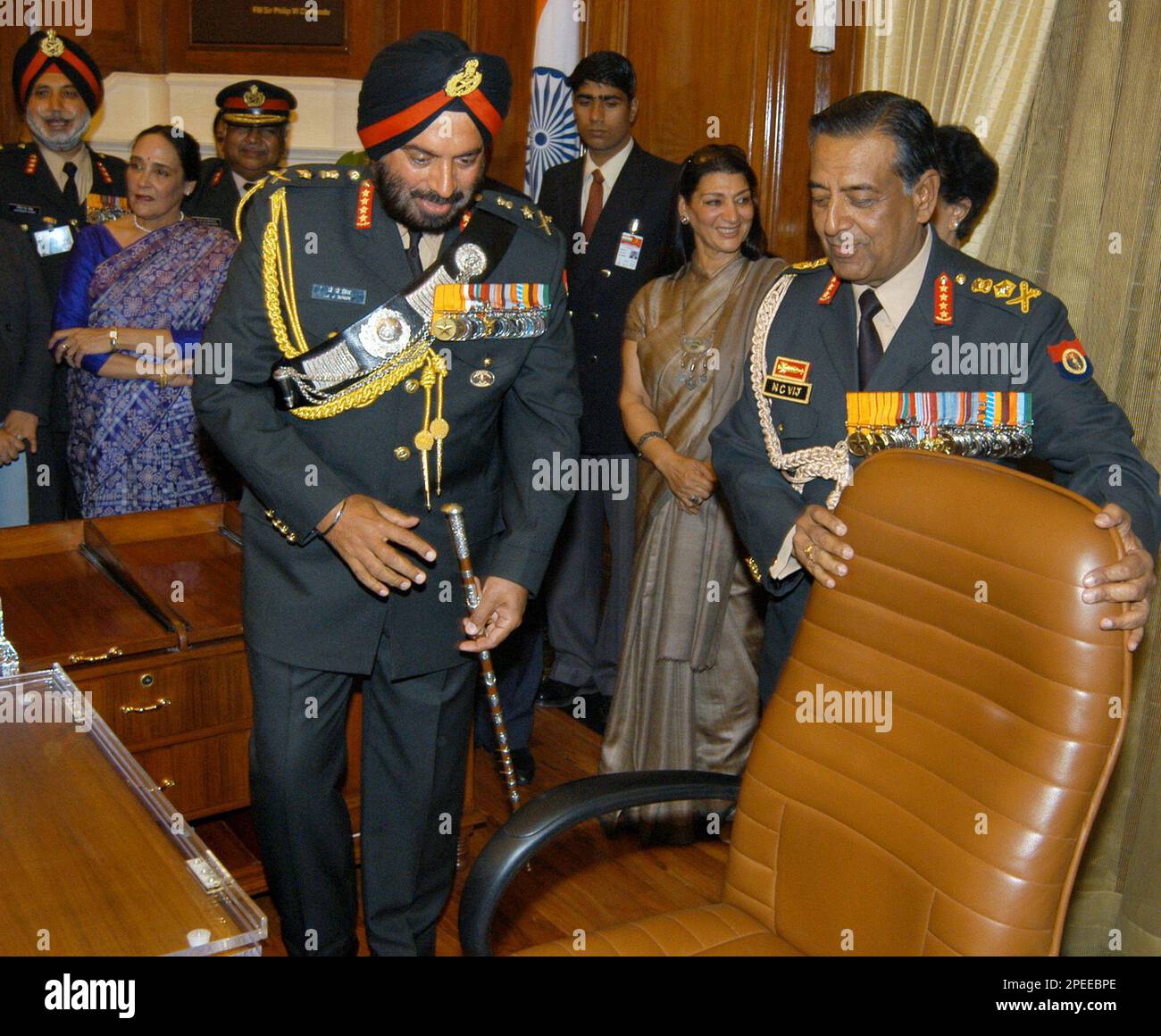 Outgoing Chief of Indian Army Gen. N.C. Vij, right, invites the new ...