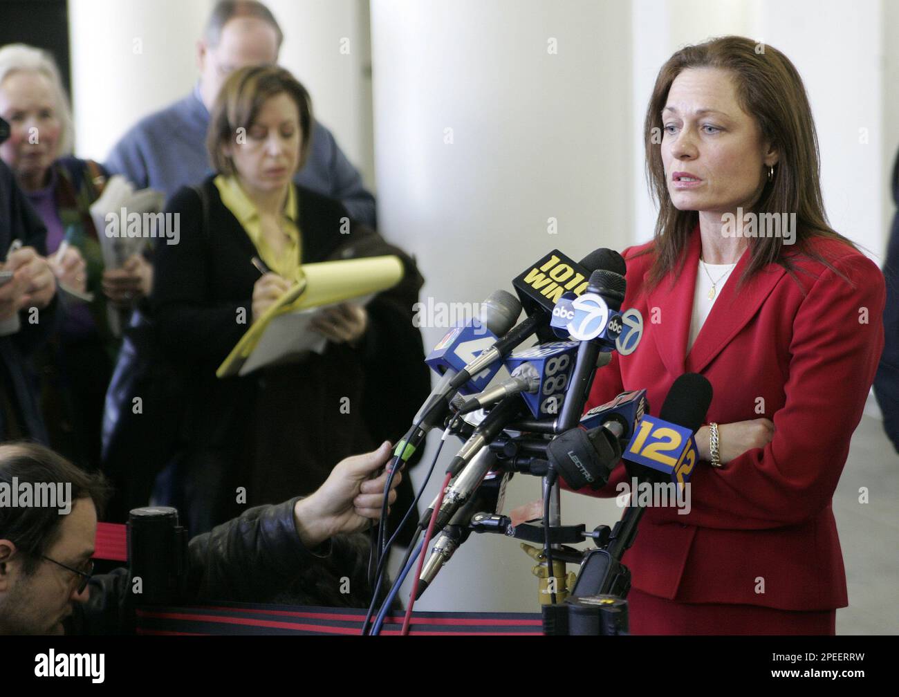 Suffolk County Assistant District Attorney Janet Albertson, right ...
