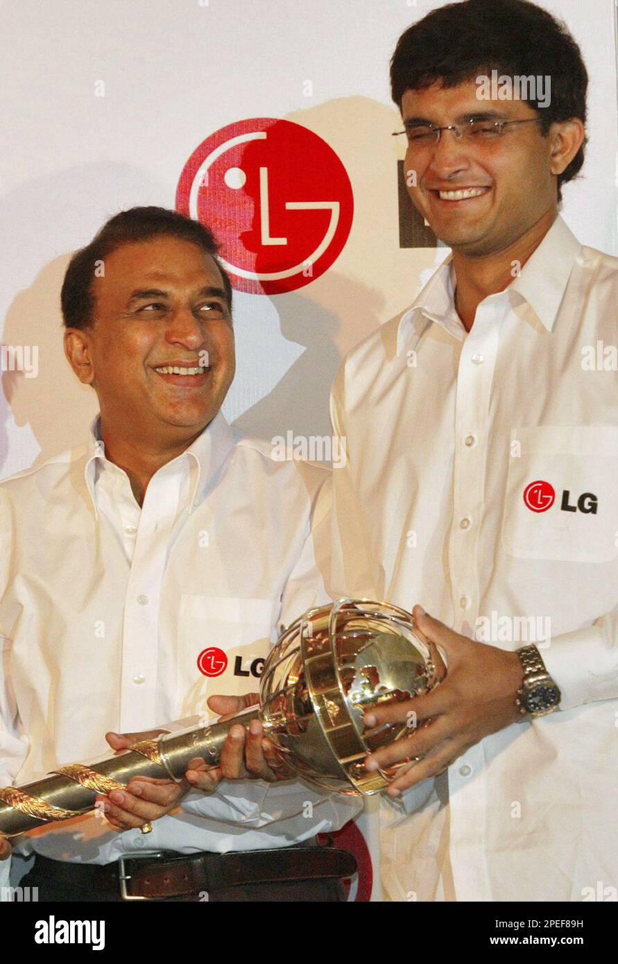 Indian cricket captain Sourav Ganguly, right, and former Indian cricketer Sunil Gavaskar share a ...