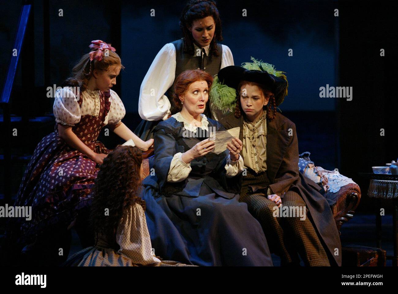 Maureen McGovern, as Marmee, reads a letter from her husband to her ...