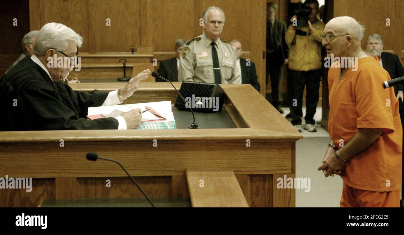 Neshoba County Sheriff Larry Myers, center, observes as Circuit Judge ...