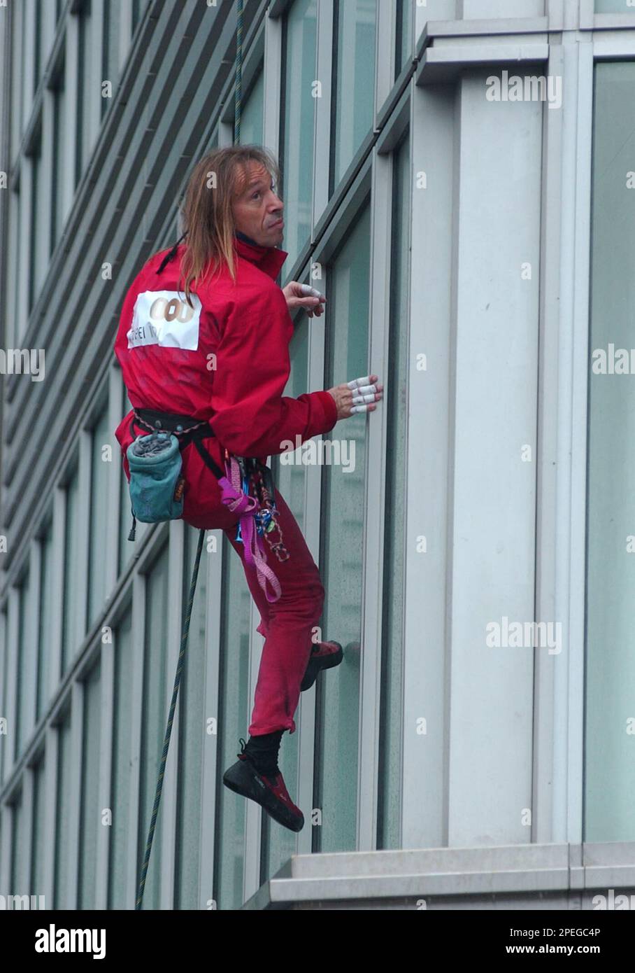 French urban climber Alain Robert, a.k.a. the French Spiderman, scales ...
