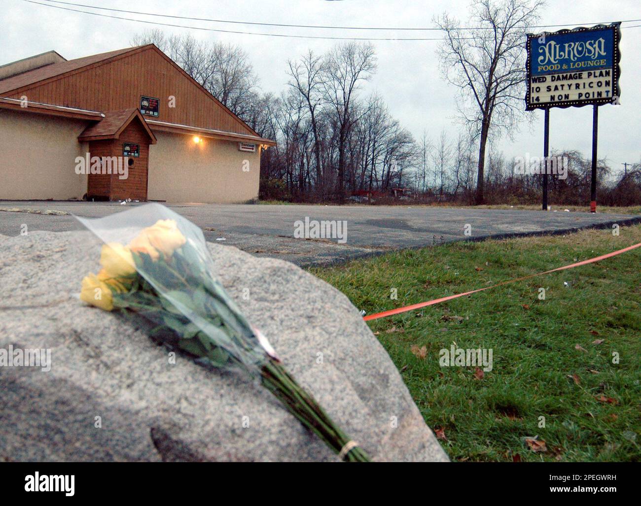 A bouquet of roses rests on a stone outside of the Alrosa Villa in ...
