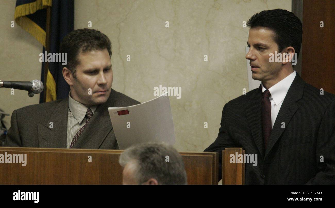 Rick Tabish, left, is shown evidence by Chief Deputy District Attorney ...