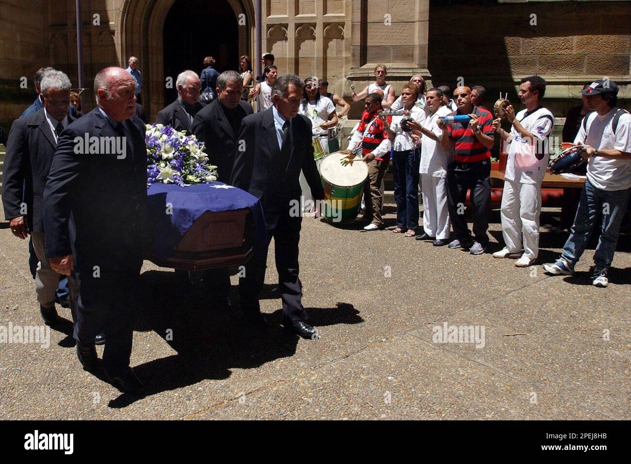 Pallbearers carry the coffin of former Australian soccer captain Johnny ...