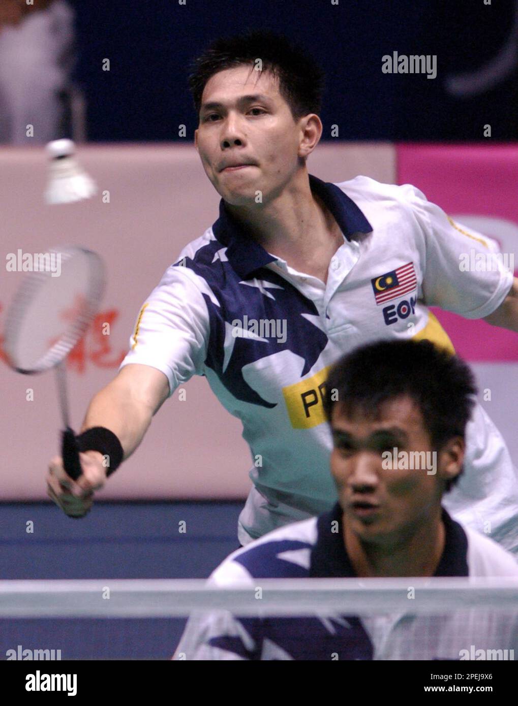 Malaysian shuttler Chew Choon Eng, top, and partner Choong Tan Fook ...