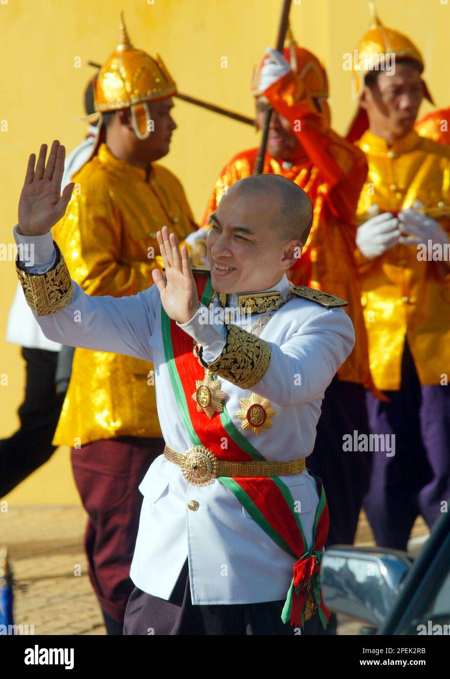King Norodom Sihamoni greets his subjects as he leaves the Silver ...