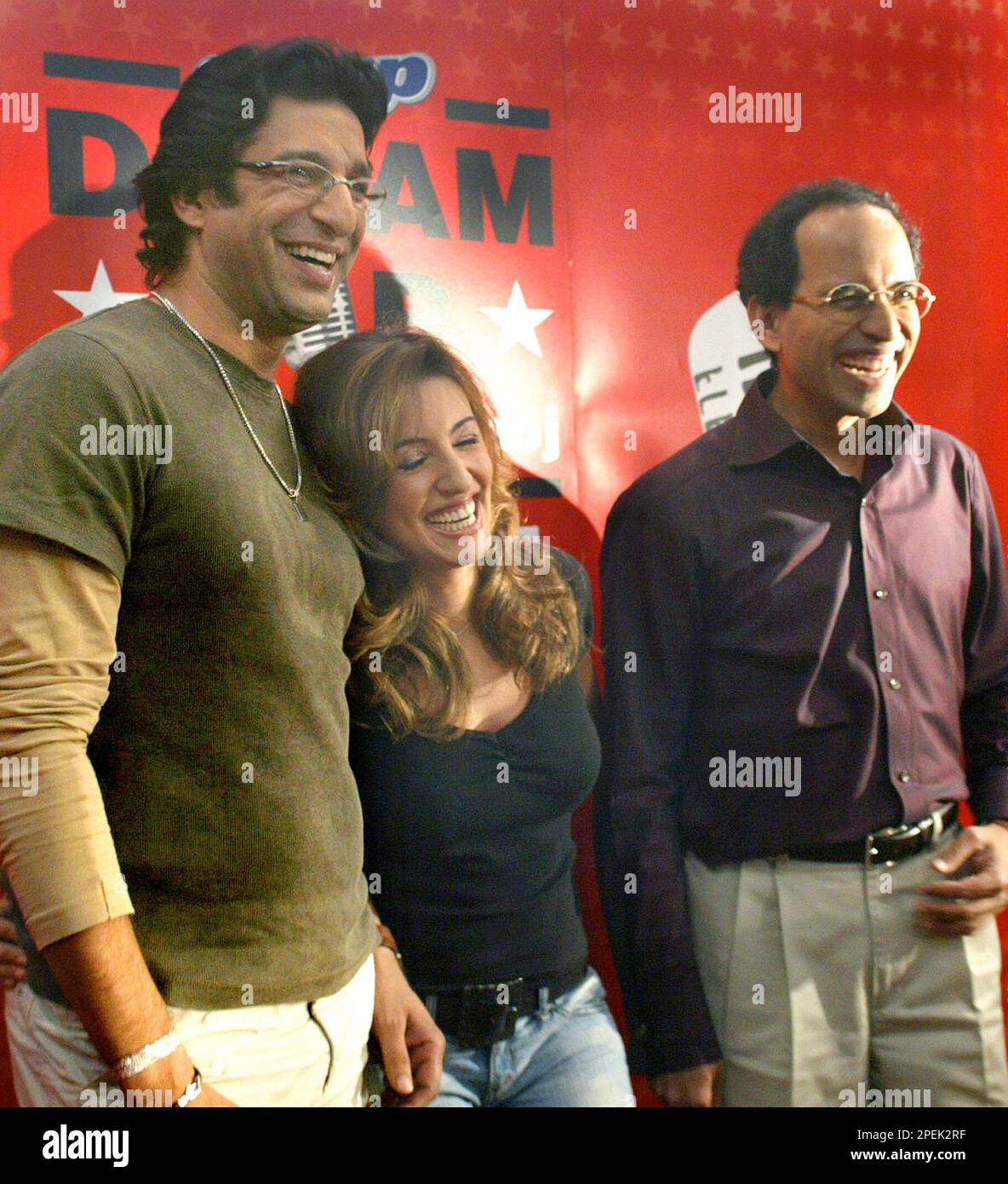 Former Pakistani cricketer Wasim Akram, left, Indian model and actoress ...