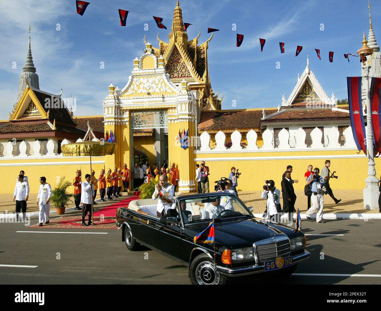 King Norodom Sihamoni greets his subjects as he leaves the Silver ...