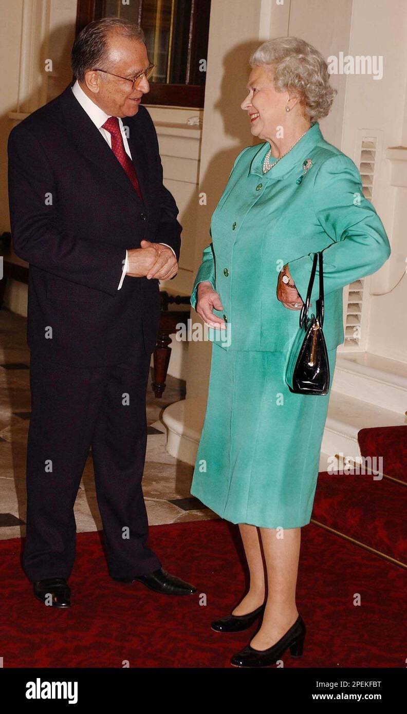 Britain's Queen Elizabeth II speaks with the President of Romania Ion ...