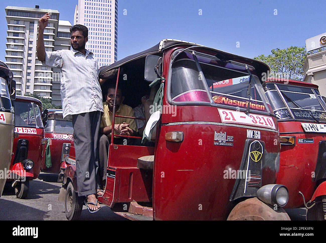 A supporter of Sri Lanka's main opposition United National Party shouts ...
