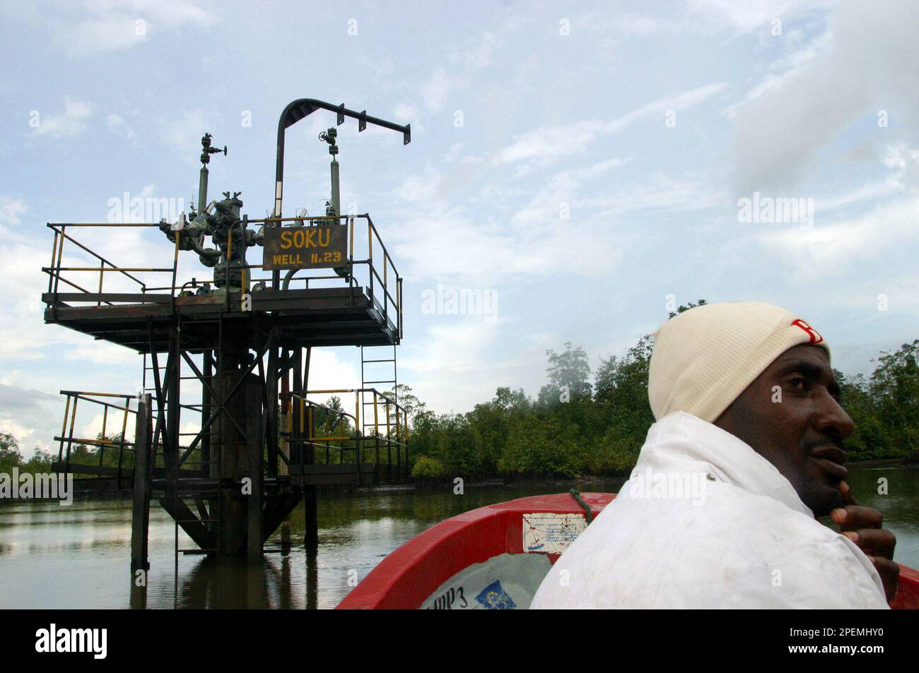 An unidentified Ijaw militant loyal to Dokubo Asari drives a spead boat ...