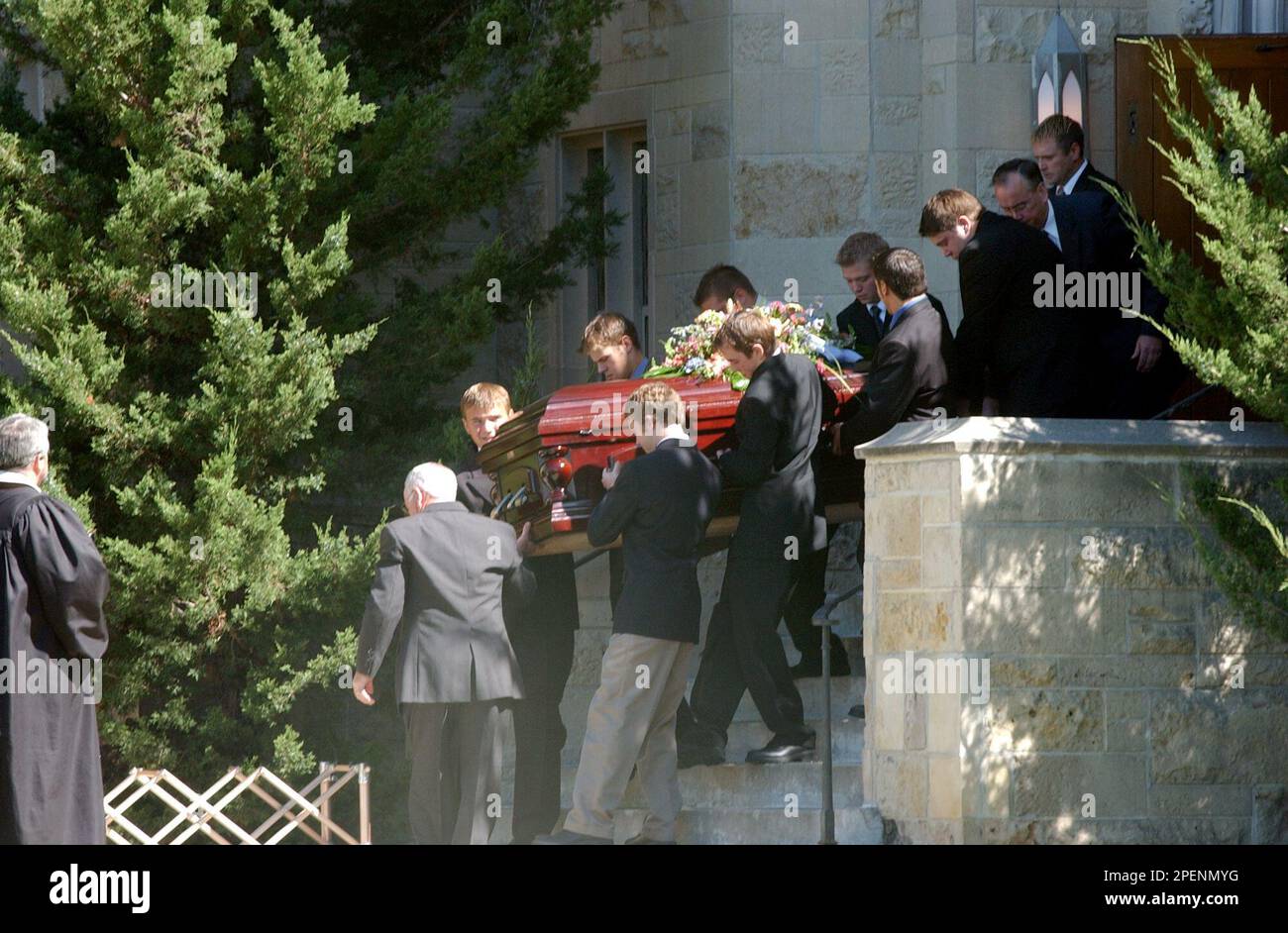 Pallbearers carry the casket of Samantha Spady out the front doors of ...