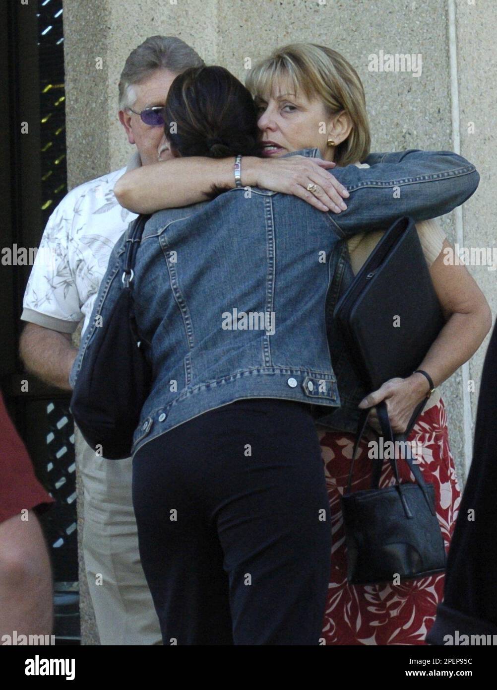 Ron Grantski, Laci Peterson's stepfather, watches as Amy Rocha, center ...