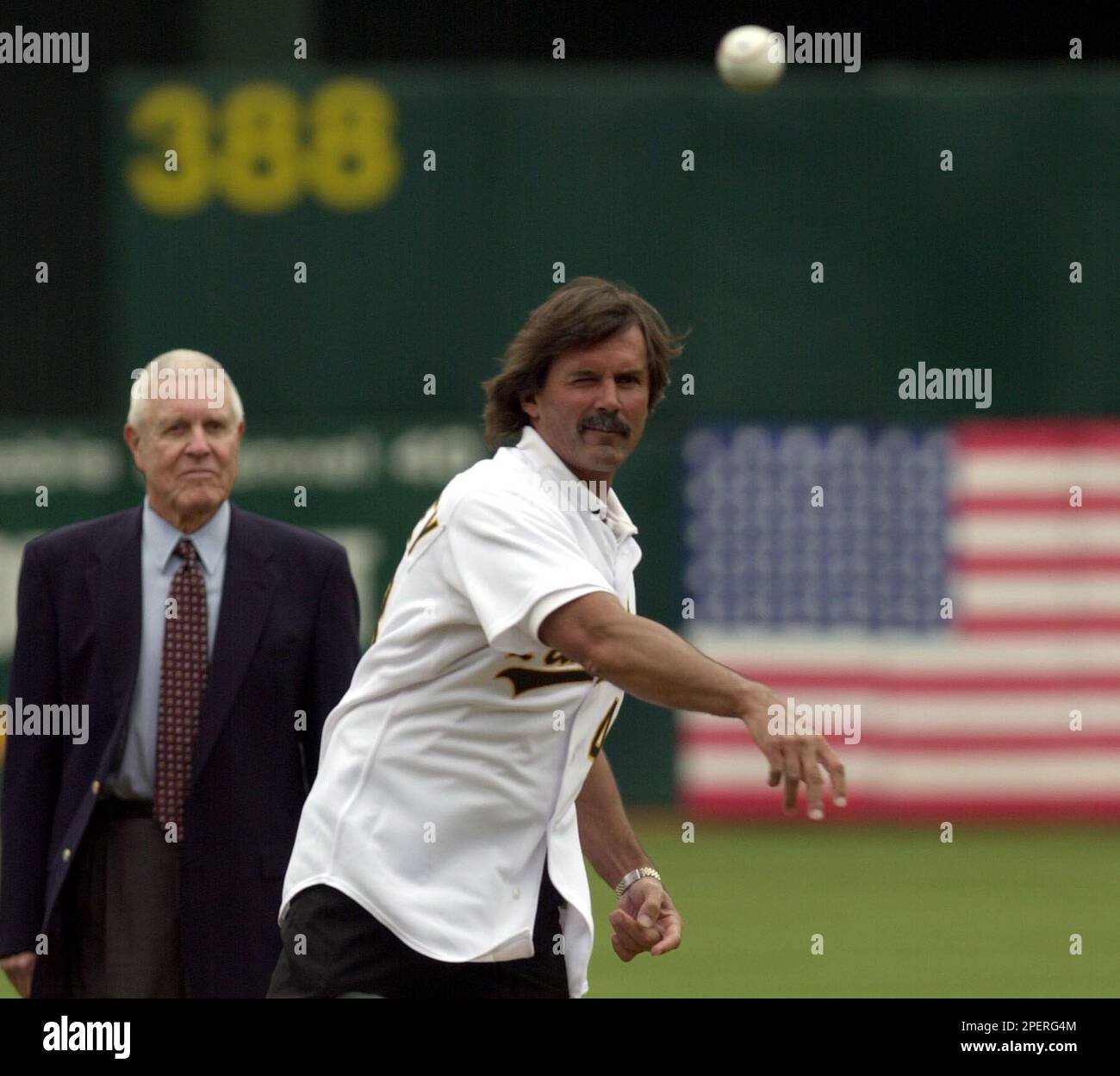 Former Oakland Athletics pitcher Dennis Eckersley throws the game's ...