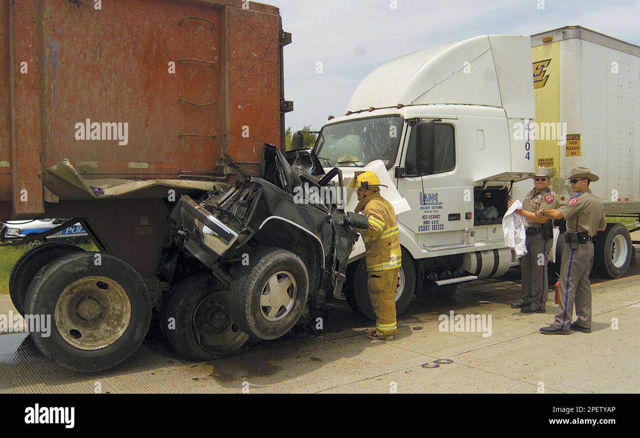 Corsicana Fire and Rescue personnel, left, and Department of Public ...