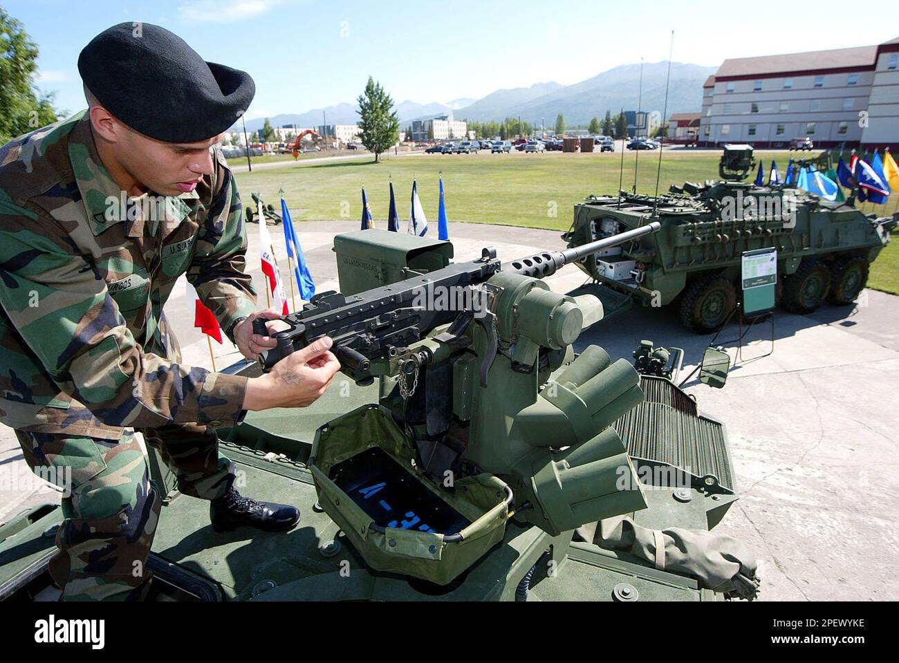 U.S Army Pfc. Angel Burgos, of Boston, talks about the 50-caliber ...