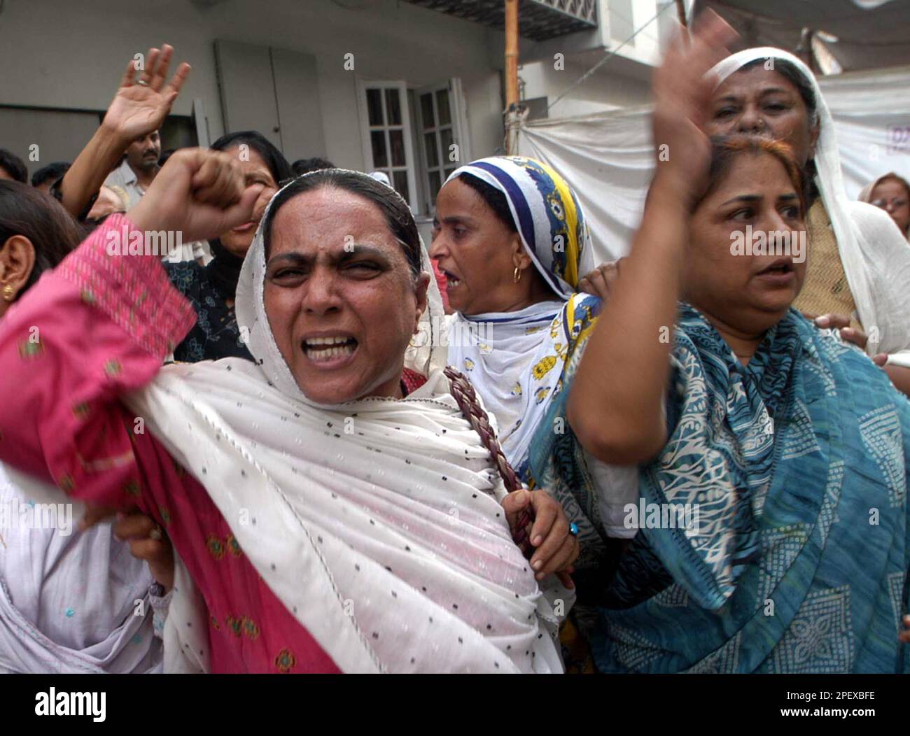 Supporters of slain Munawar Soharwardi, a local leader of Benazir ...