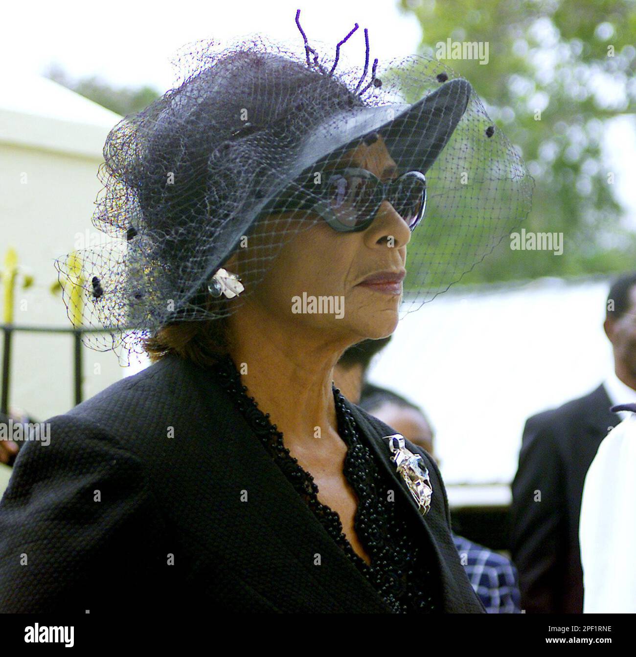 Lady Stella St. John, widow of Sir Harold, views her husband's body ...