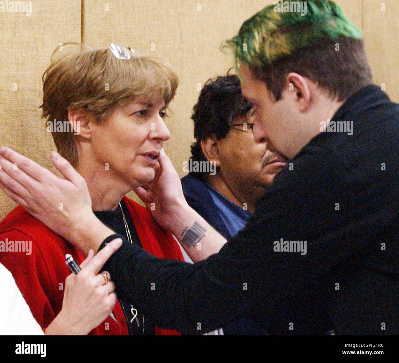 Former Columbine High School student Brooks Brown, right, talks to his ...