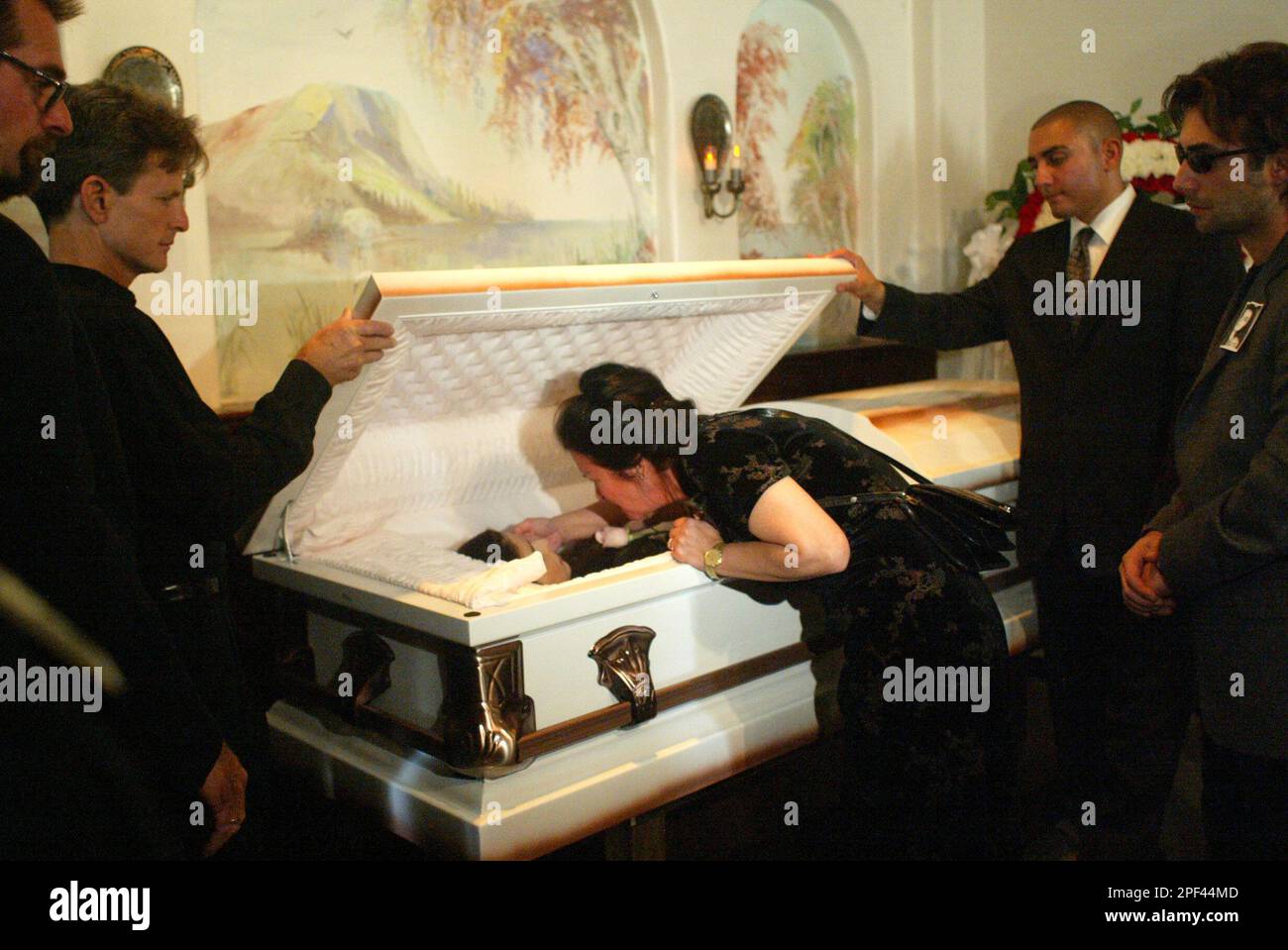 Zerrin Arbas, center, mourns at the funeral of her daughter Turkish ...