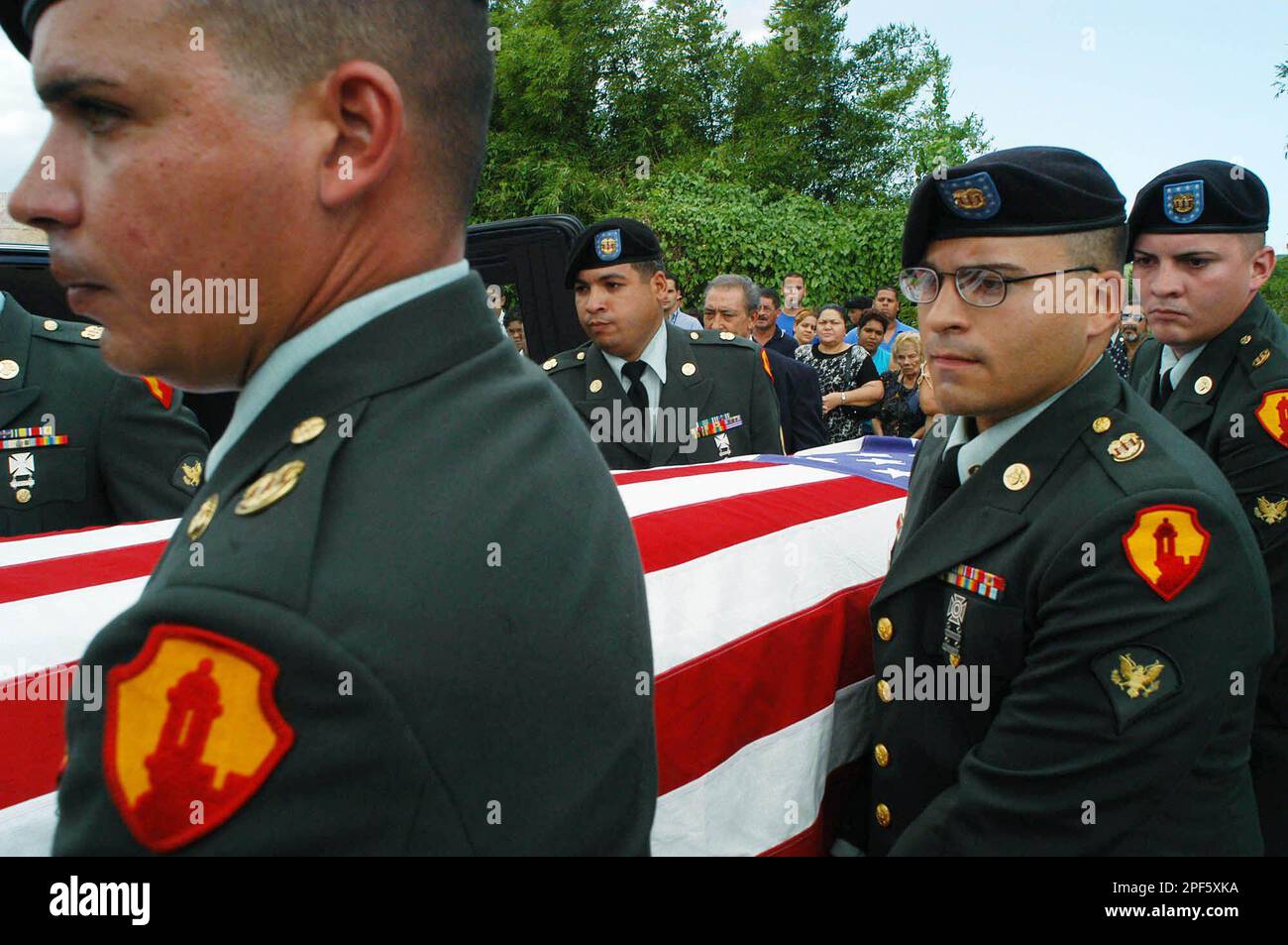 U.S. Army pallbearers carry the coffin of Army Spc. Ramon Reyes Torres ...