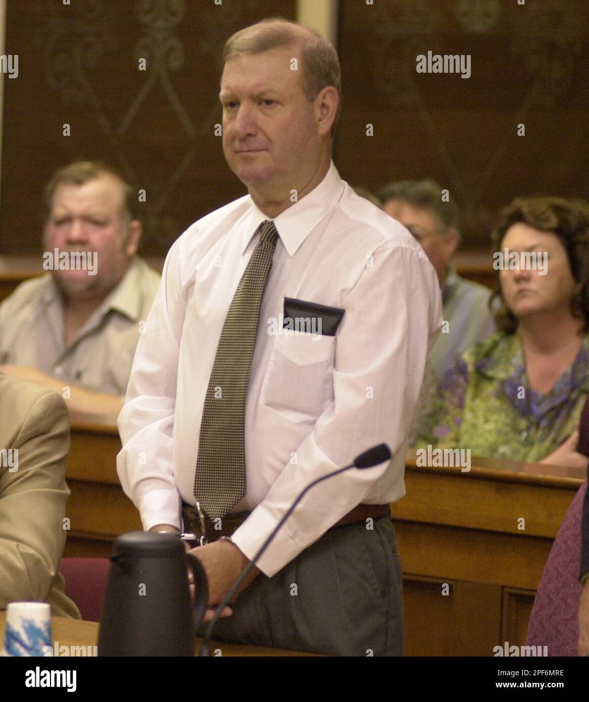 Hank Butson stands in court as his family looks on in Caledonia ...