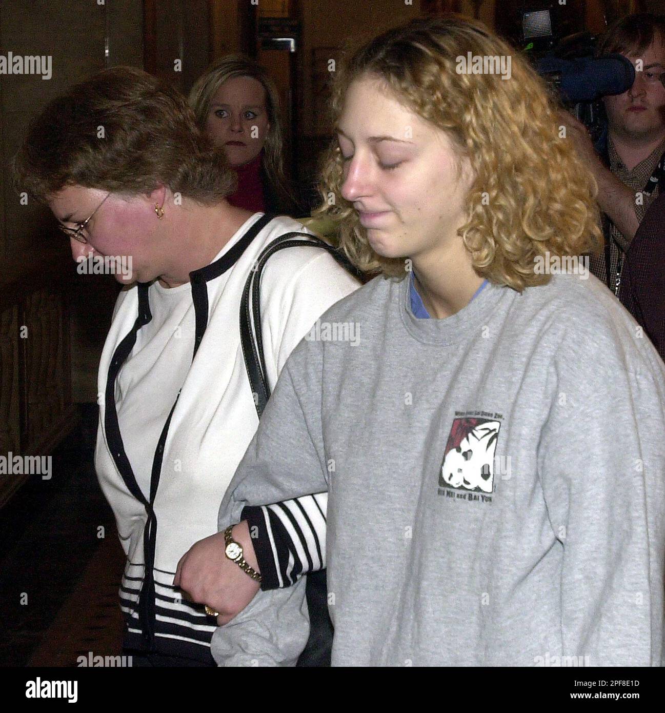 Buffalo State College student Colleen Smith, right, leaves court after ...