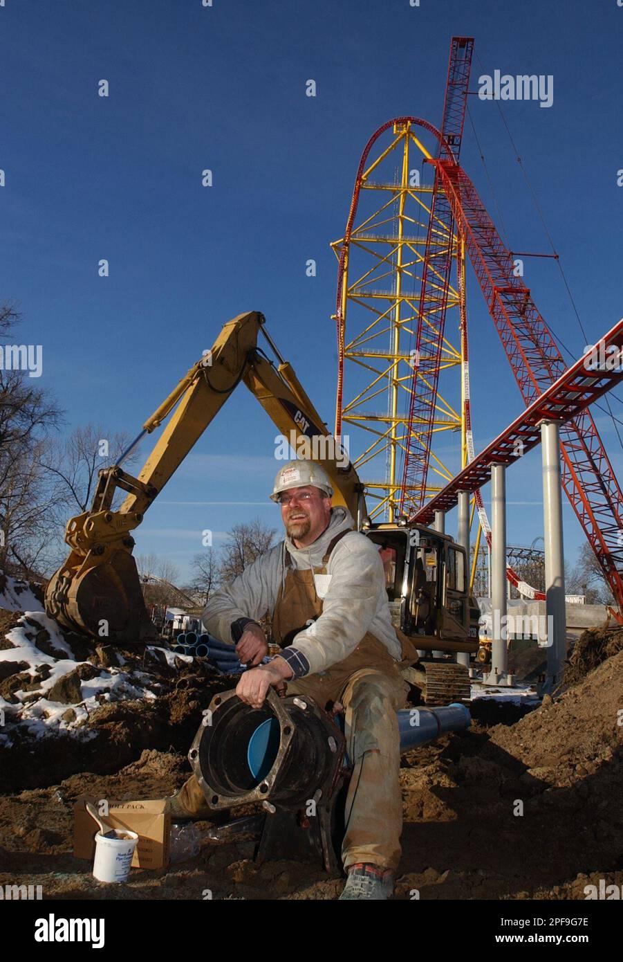 Dave Garra, an employee of Lucas Plumbing, works on connectors for ...