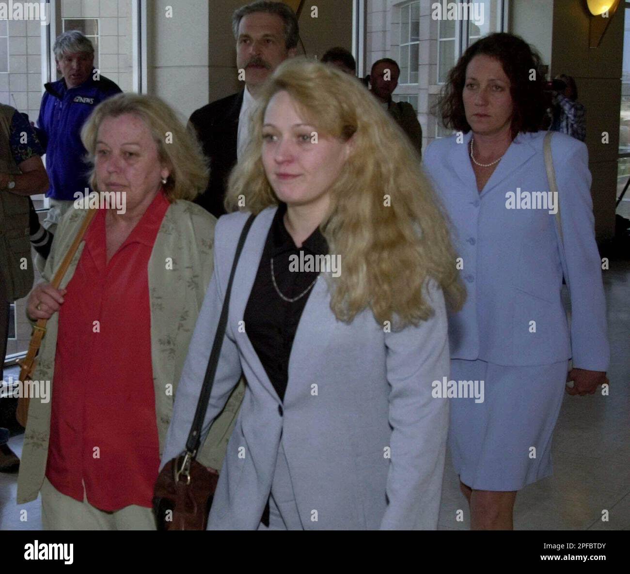Therapists Connell Watkins, front left, and Julie Ponder, back right ...
