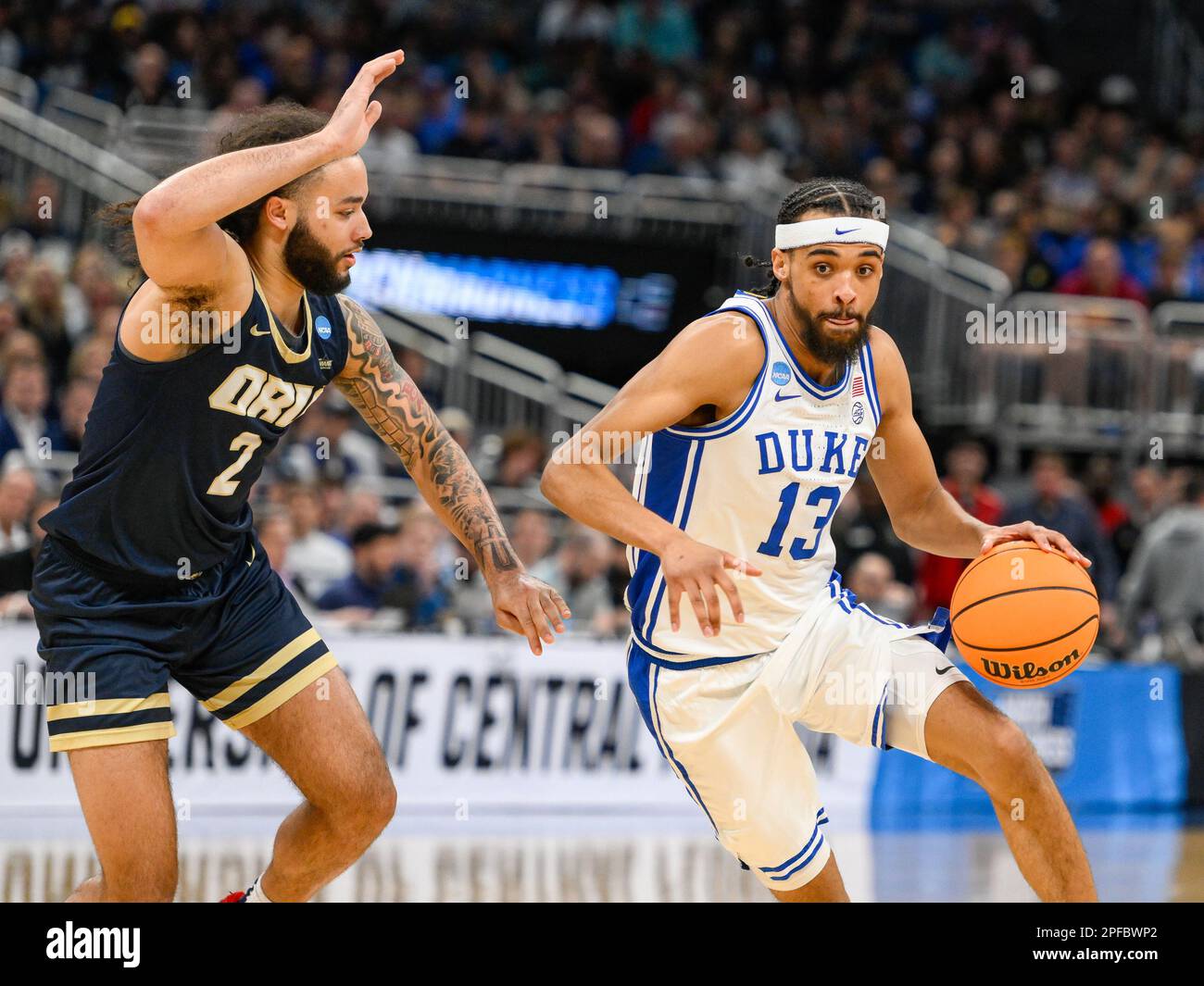 16 mars 2023: Duc Blue Devils garde Jacob Grandison (13) dribbles ...